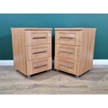 A pair of modern Bedside Chests, possibly Beech, each fitted three ...