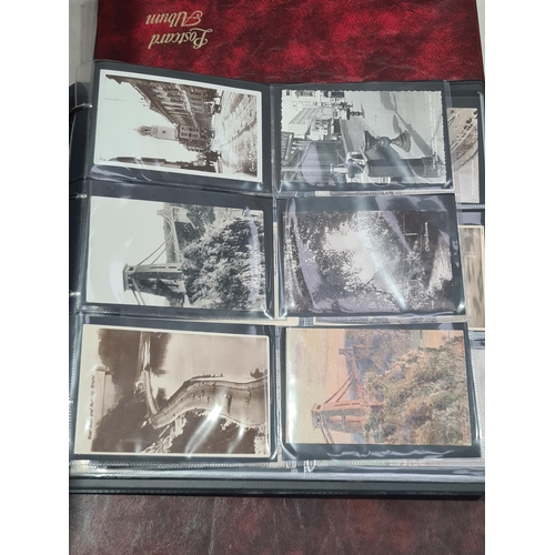 Three Postcard Albums containing a collection of assorted Postcards to ...
