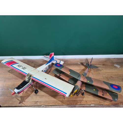 A petrol driven radio controlled Bi-Plane and a single wing Aircraft (R11)