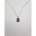 An Amethyst and Diamond Pendant claw set octagonal mixed-cut amethyst ...