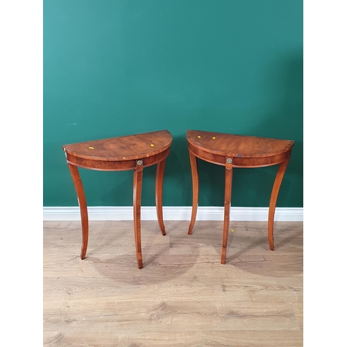 A pair of reproduction Demi Lune Console/Side Tables on splayed tapered ...
