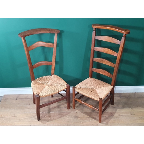 Two high-backed Prayer Chairs with rush seats (R7)