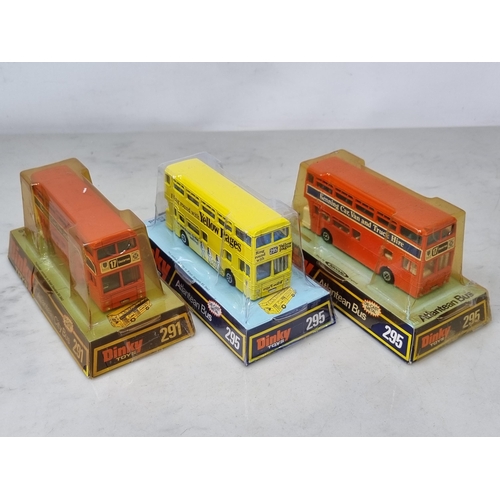 A boxed Dinky Toys No.291 Atlantean City Bus and two boxed No.295 ...