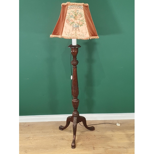 A Georgian style mahogany Standard Lamp on carved tripod base, fitted ...