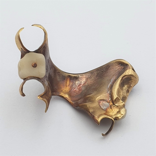 A gold coloured Denture Plate, approx 19gms