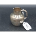 A silver Cream Jug with loop handle, 3 1/4in H, Birmingham 1906, 65gms.