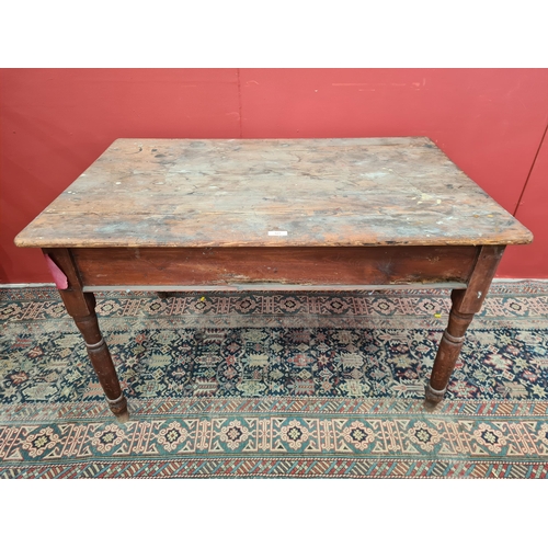 A pine Scrub Top Table, raised on turned supports with single fitted ...