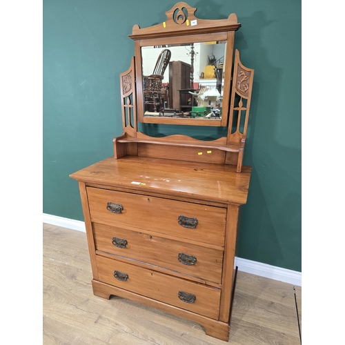A satinwood Dressing Chest fitted three long drawers, 4ft 9in H x 3ft W ...