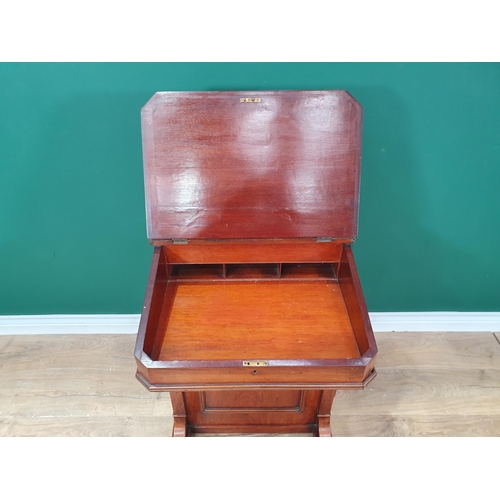 A walnut Davenport with inset gilt tooled lift up writing surface, and ...
