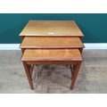 A teak "Remploy" Nest of three Tables. (R8).