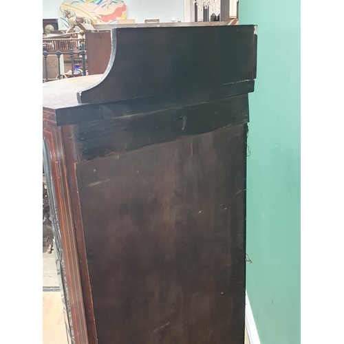 A mahogany bow-fronted glazed Corner Cupboard with undertier raised on ...