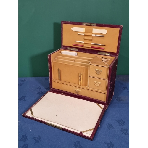 A red leather and gilt tooled Stationary Case, with lift up lid and ...