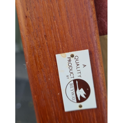 A pair of mid-Century Reyway Chairs, with loose cushions, bearing the ...