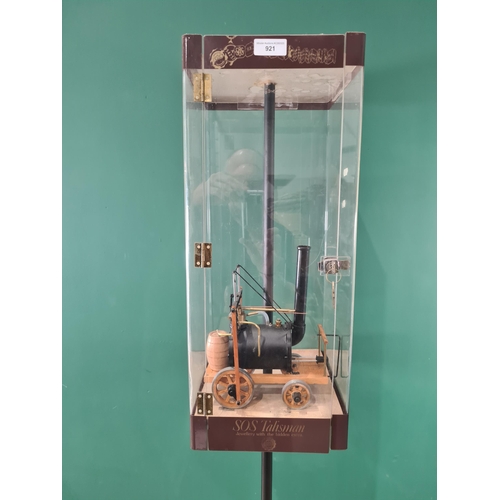 An SOS Talisman Display Stand containing a model of a steam engine, 6ft ...