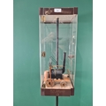 An SOS Talisman Display Stand containing a model of a steam engine, 6ft ...