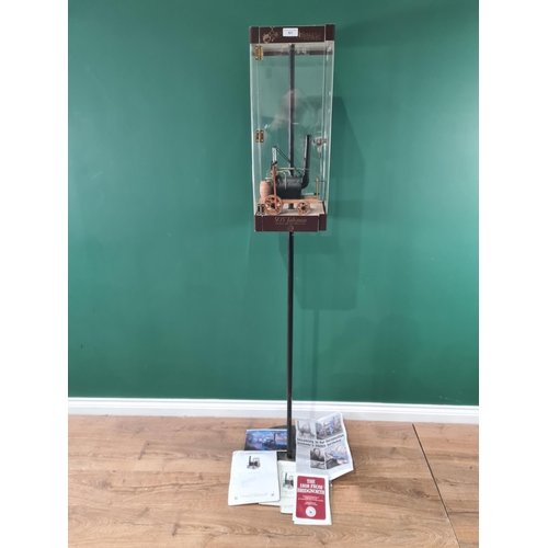 An SOS Talisman Display Stand containing a model of a steam engine, 6ft ...