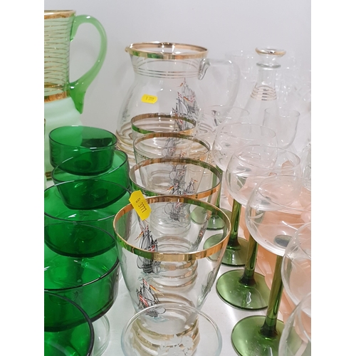 A green glass Lemonade Set, a Lemonade Set decorated ships, a Dressing ...