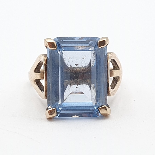 A Cocktail Ring set synthetic spinel, claw-set rectangular step-cut ...