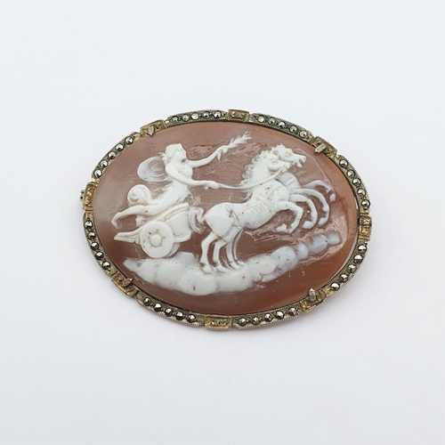 A carved shell Cameo Brooch depicting Boudica in her chariot in silver ...