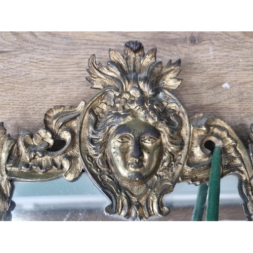 A pair of Rococo style brass framed Girandole Wall Mirrors with Pagan ...