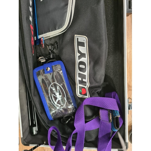 A Hoyt Eclipse Bow with Arrows and accessories, in travel hardcase, and ...