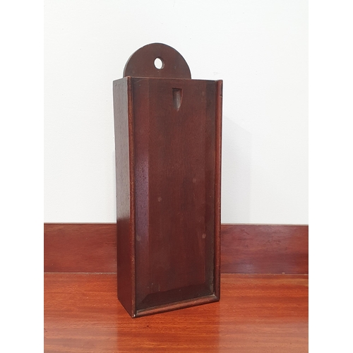 An antique mahogany hanging Candle Box with sliding lid, 5 1/2in W 15in H
