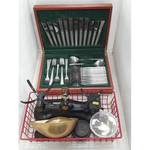 A boxed stainless steel Cutlery Set, a set of brass and cast iron ...