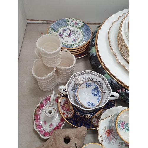 A gilt painted Fire Mark 'Salop', a selection of pottery Oil Lamps, a ...