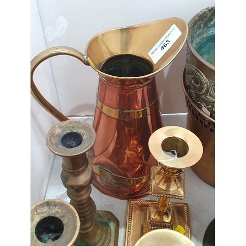 A collection of copper and brassware including Candlesticks, Jersey Cow, Jug, Bowls, Pestle and Mort