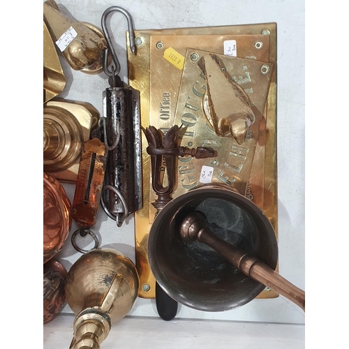 A collection of copper and brassware including Candlesticks, Jersey Cow, Jug, Bowls, Pestle and Mort