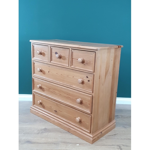 A pine Chest of three short over three long drawers with moulded fronts ...