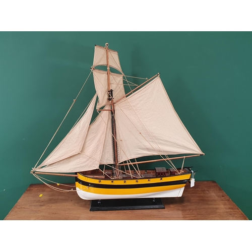 A painted model Ship of "Hunter 1797", mounted on black painted ...