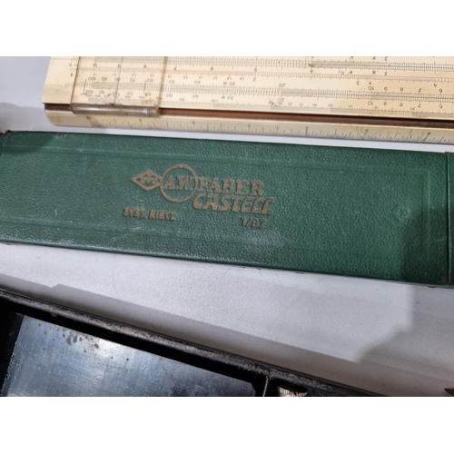 A box containing a Planimeter (fixed arm), a Winsor and Newton ...