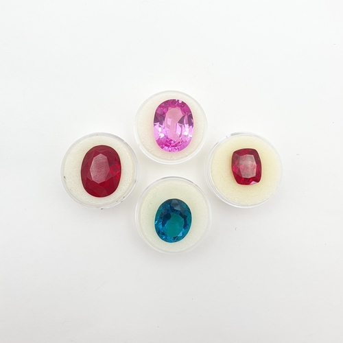 Three large synthetic Rubies total approx carat weight 59 carats and a ...