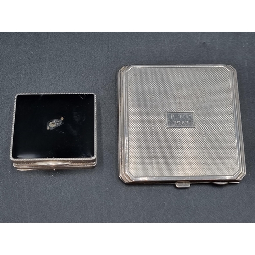 A Continental small silver and black enamel Powder Compact with engine ...