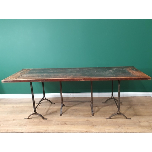 A Trestle Table with rectangular polished oak top, raised upon three ...