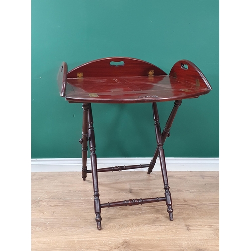 A 19th Century mahogany folding Butler's Tray with four pierced shaped ...