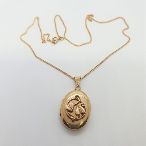 A 9ct gold Clogau oval Locket applied hearts motif to front, approx 9gms