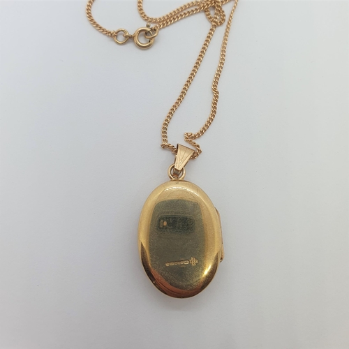 A 9ct gold Clogau oval Locket applied hearts motif to front, approx 9gms