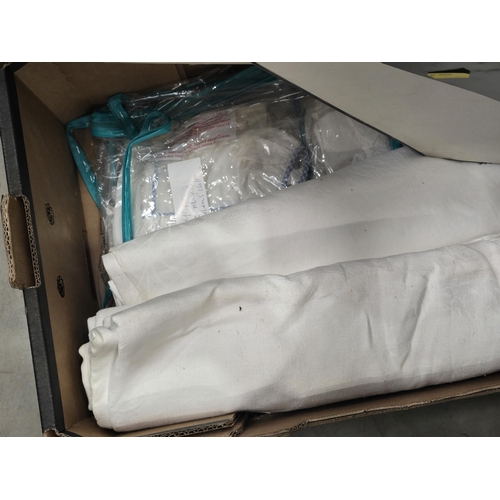 A box containing Tablecloths, Table Linen, two Harvey Nicholls pure ...