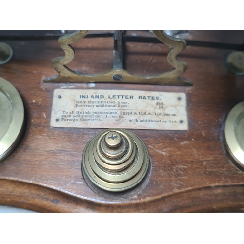 A set of Postal Scales and Weights and two Morse Code instruments, (R8)