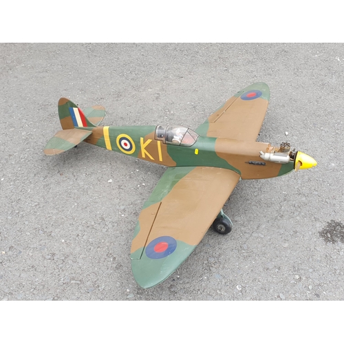 A petrol driven radio controlled Model of a Spitfire 4ft 9in W x 3ft 11in L
