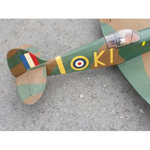 A petrol driven radio controlled Model of a Spitfire 4ft 9in W x 3ft 11in L