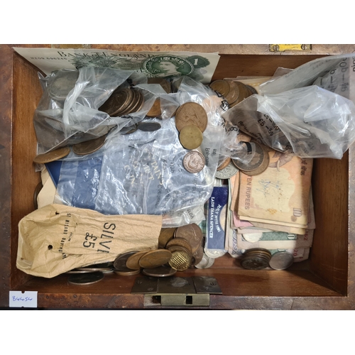 A collection of British and World Coins, to include a George II 1740 ...