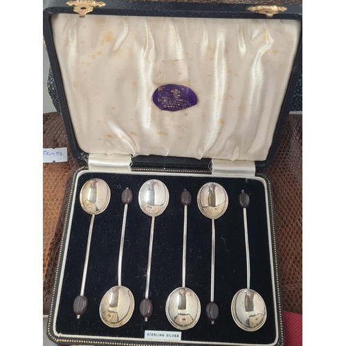 A Victorian Corset, a Scrap Album containing postcards and cut-outs ...