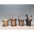 Four antique Pestle and Mortars and three spare Pestles (R6)