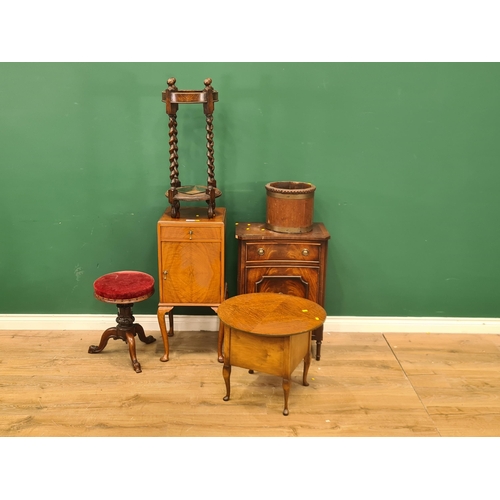 A Victorian rosewood revolving Piano Stool, a walnut Pot Cupboard, a ...