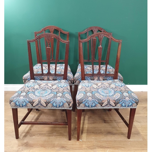 A set of four Walnut camel back dining chairs with blue and gold ...