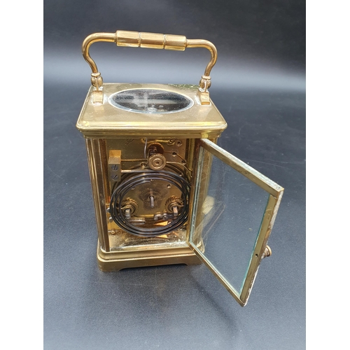 An early 19th century French brass cased Carriage Clock with white ...
