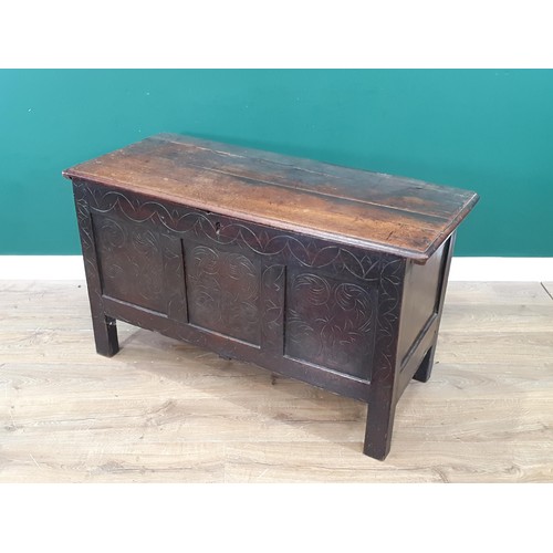 An antique oak Coffer, with three sunken panel front with carved ...